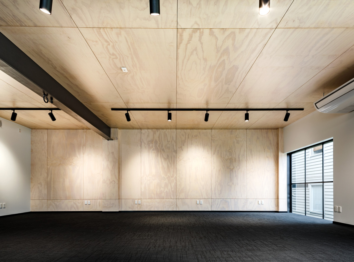 From Concrete Workshop to Plywood-Lined Office – EBOSS