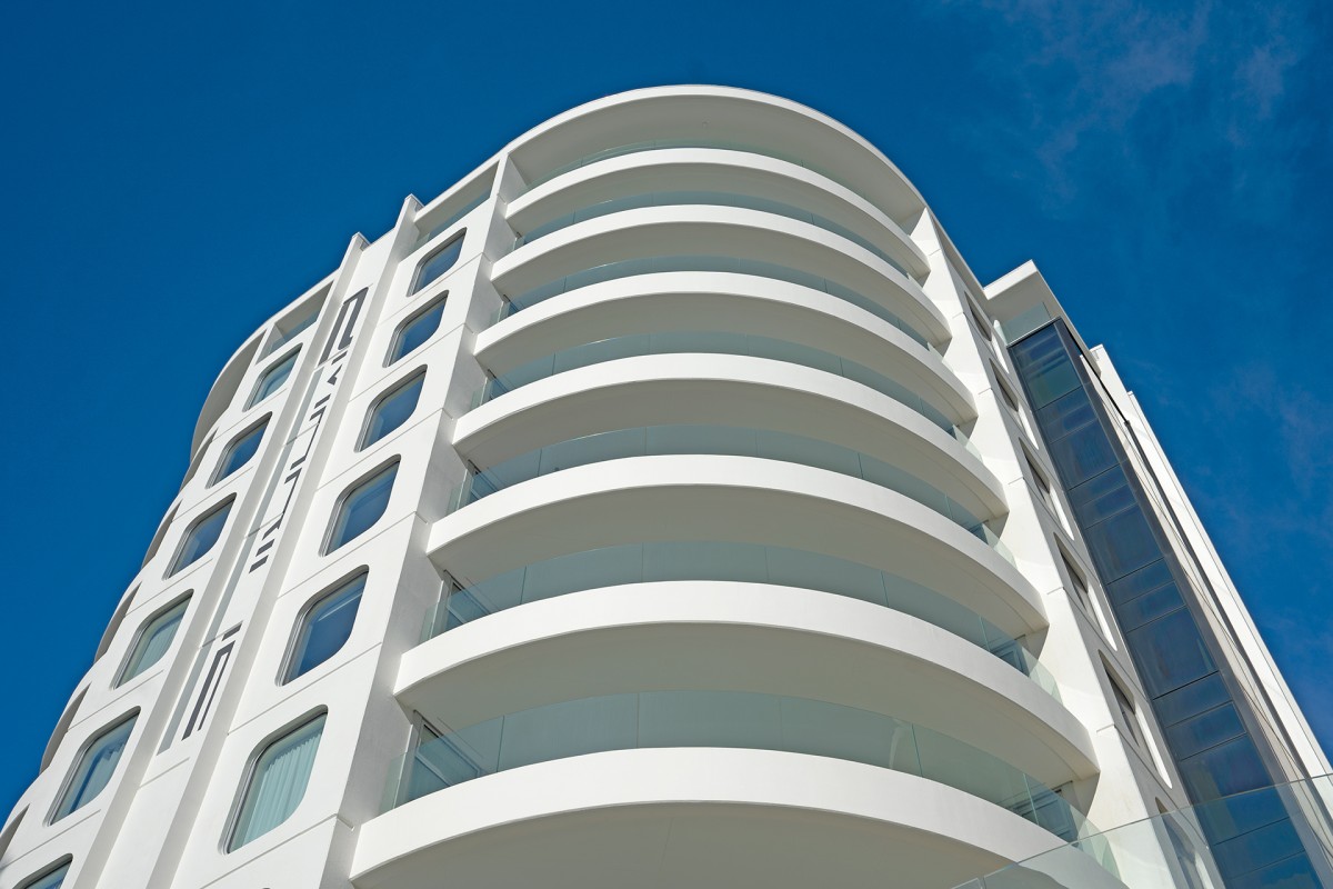 Achieving Curved Glass Balustrades for Oceanside Tower – EBOSS