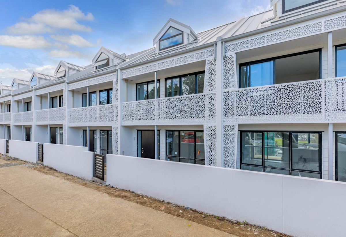 Slim Intertenancy Walls Provide Acoustic Control and Space Savings for Townhouse Development – EBOSS